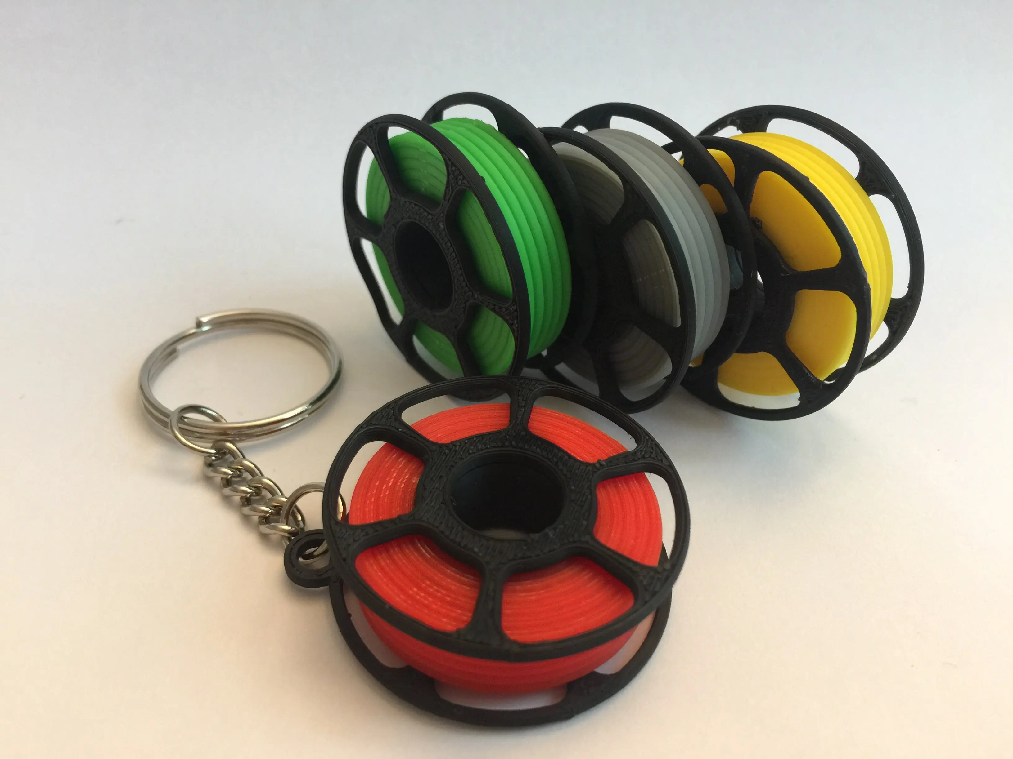 Other STL Download - Mini Filament Spool Keychainby Creative Capybara