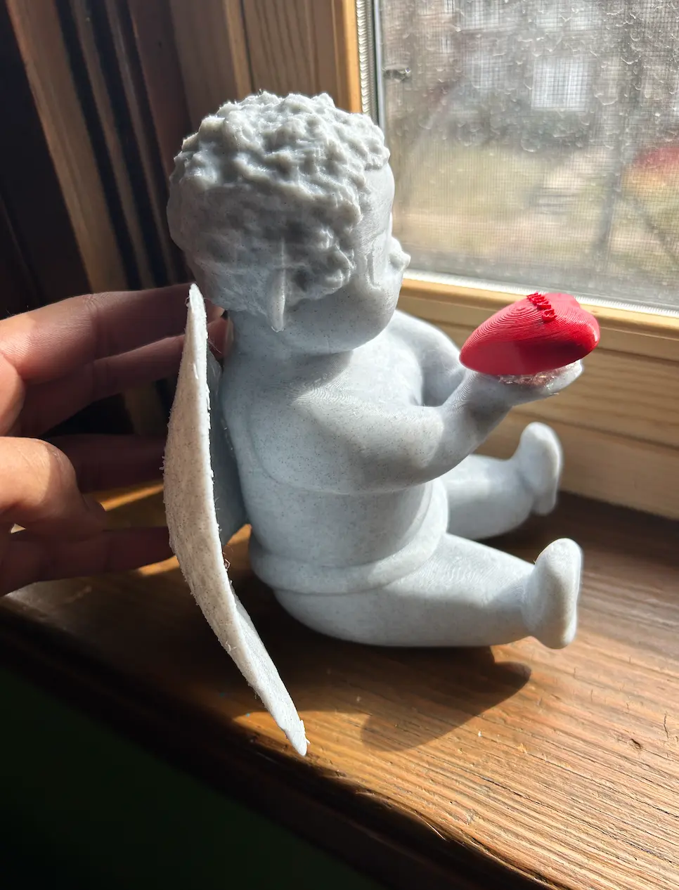 Free Sculptures & Artworks STL Download - Cute Cupid Holding a Heart ...