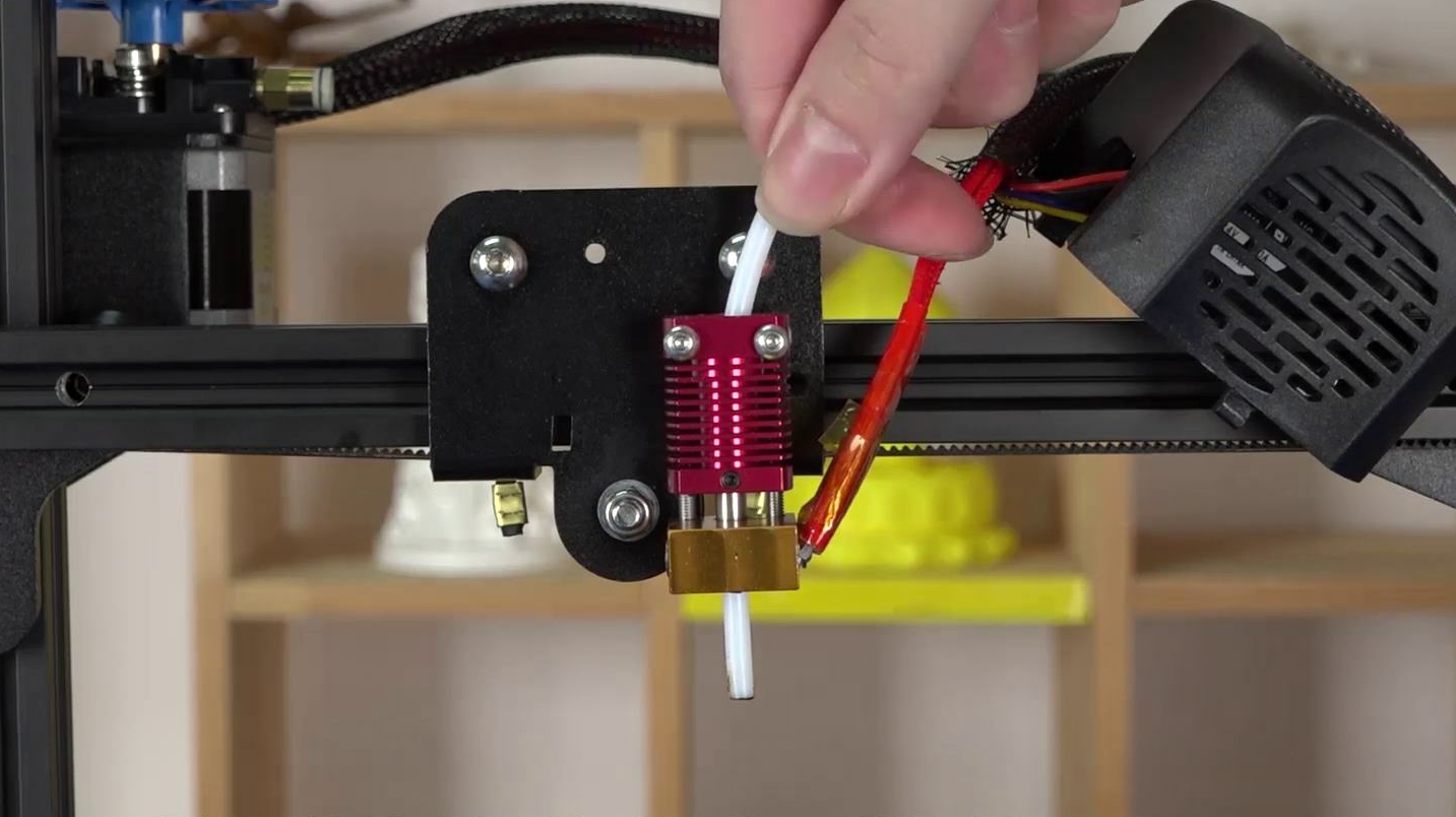 Service tutorial Ender-3 V2 clean the hotend throat with needle. | Creality Cloud