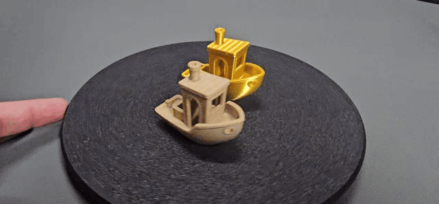 Printed a very basic round, turning, table thingy. It works. My idea ...