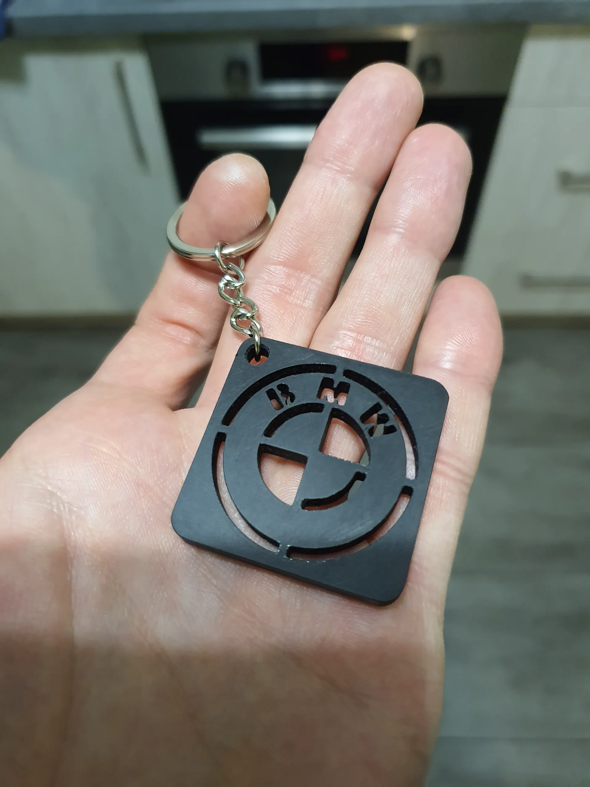 BMW Keychain This keychain is a sleek and minimalistic replica of the ...