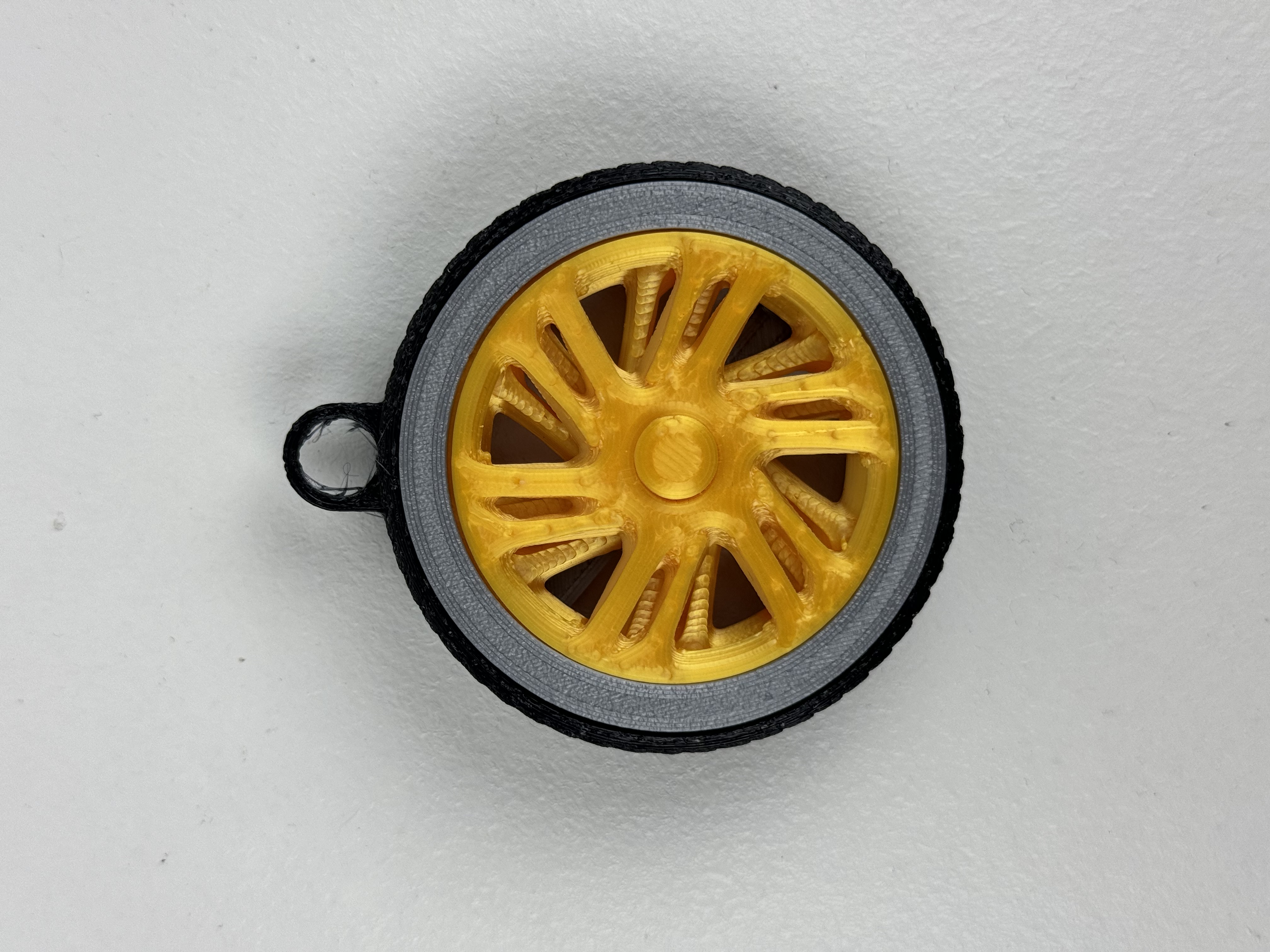Spinning Rim Keychain With Tire | 3D-Modelle herunterladen | Creality Cloud