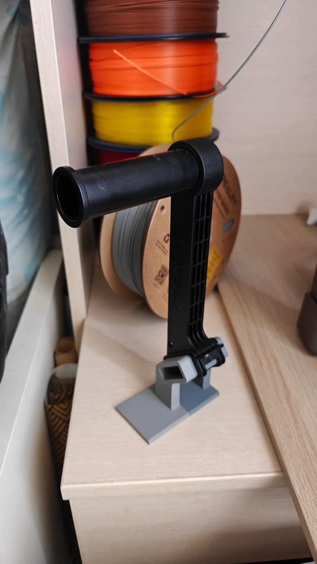 Here is a photo of the one I printed. Works great. Just double-side tape it wherever you wish ...