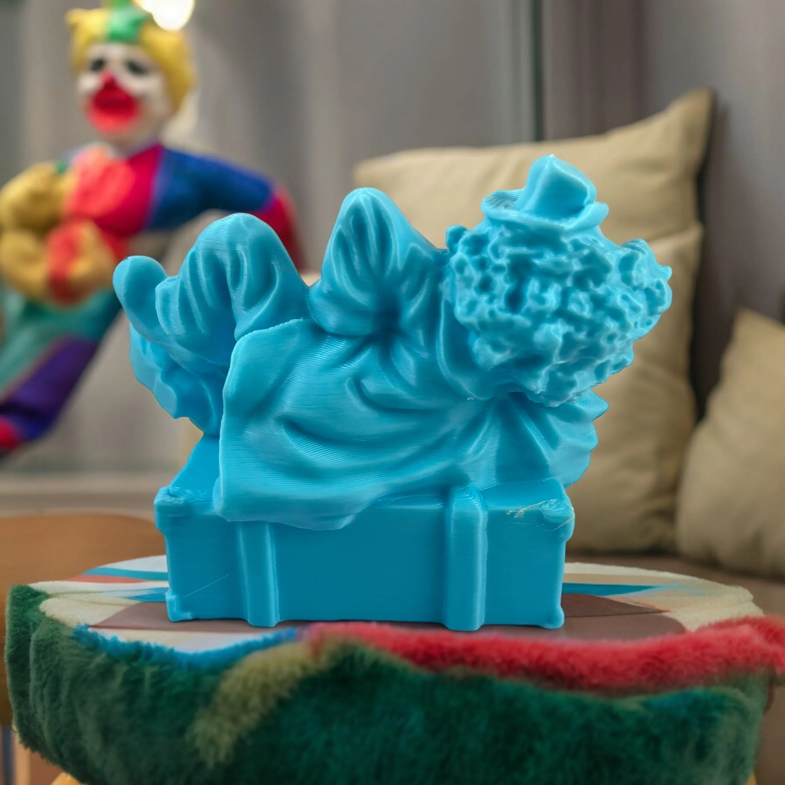 Characters & Creatures STL Download - Clown lying on a suitcaseby Motek3D