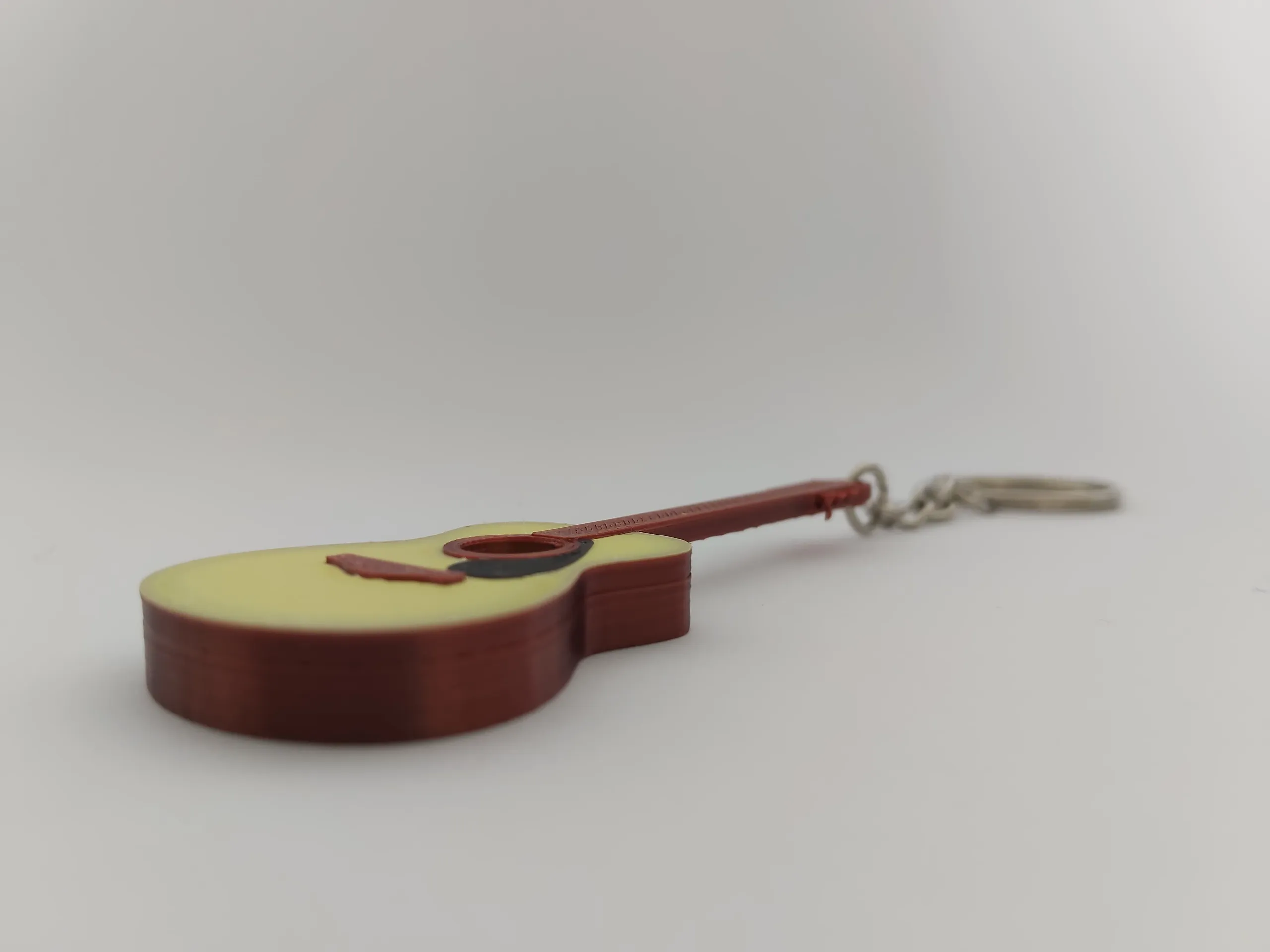 Hi all! Just finished this mini guitar keychain and I'm really happy ...