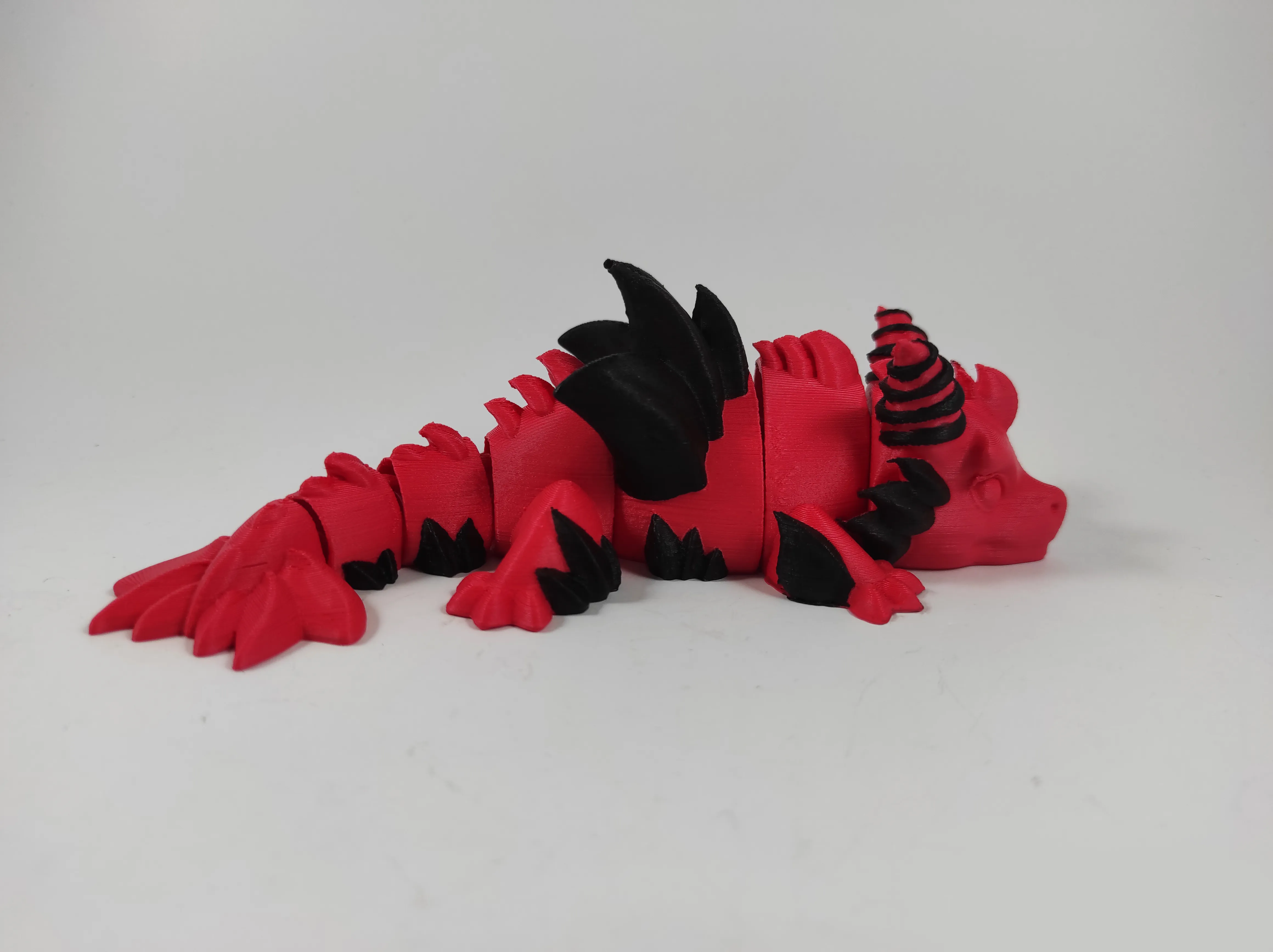 [Exclusive] Flexi Dragon - Articulated Baby Dragon with Wing | 3D models download | Creality Cloud