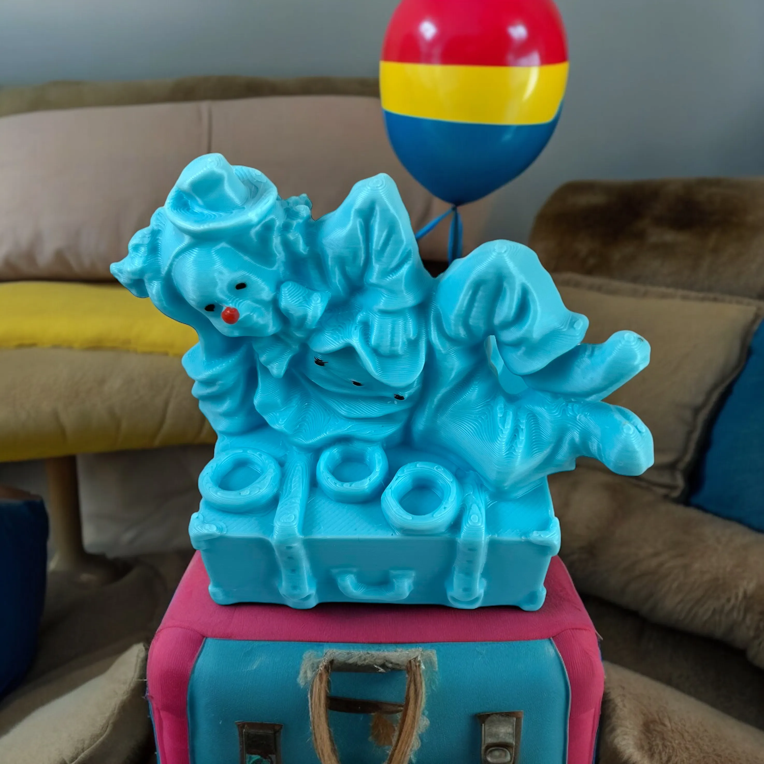 Characters & Creatures STL Download - Clown lying on a suitcaseby Motek3D