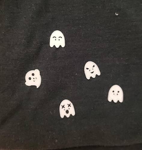 This 3D printable model is a 5-pack ghost buttons, part of a Clothes ...