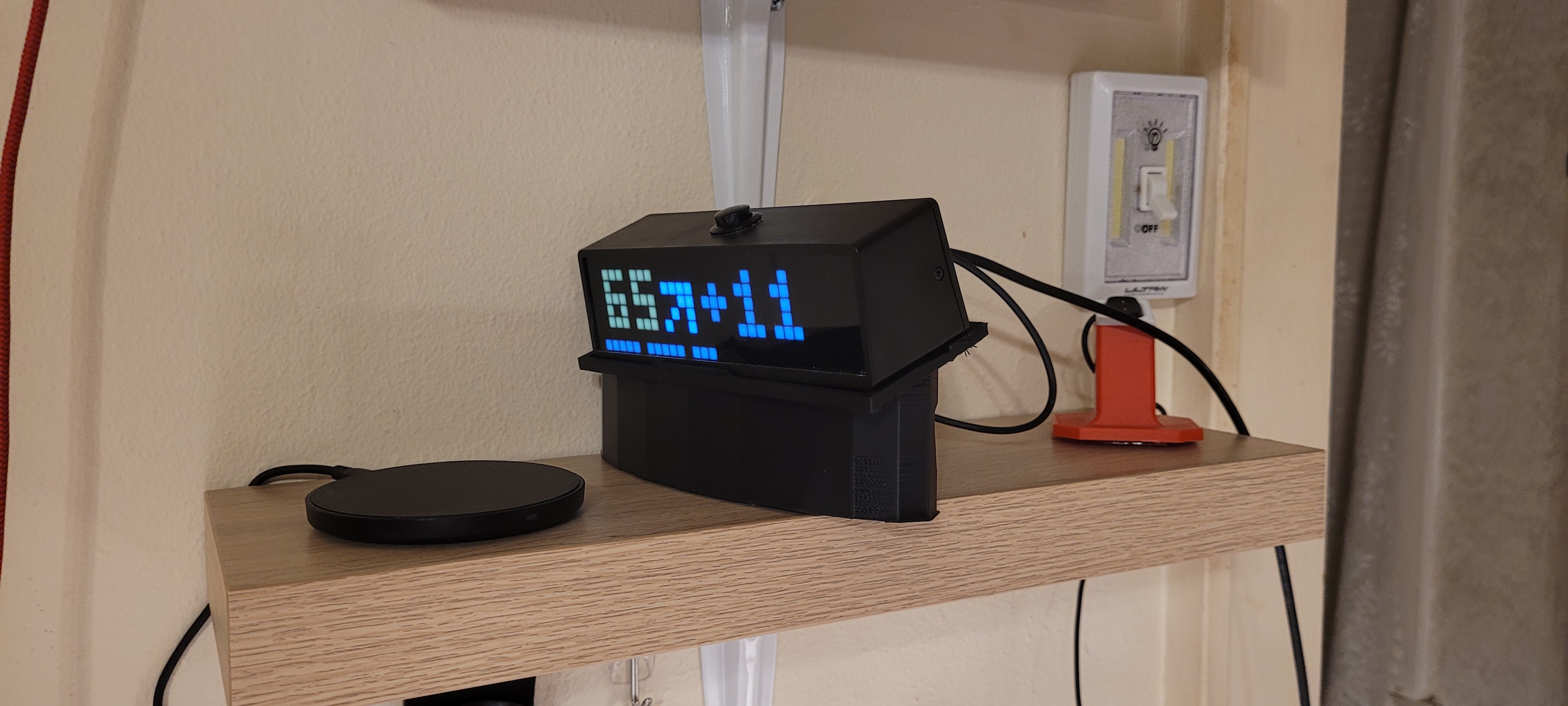 This stand makes it easier to read my Sugar Pixel while in bed. This ...