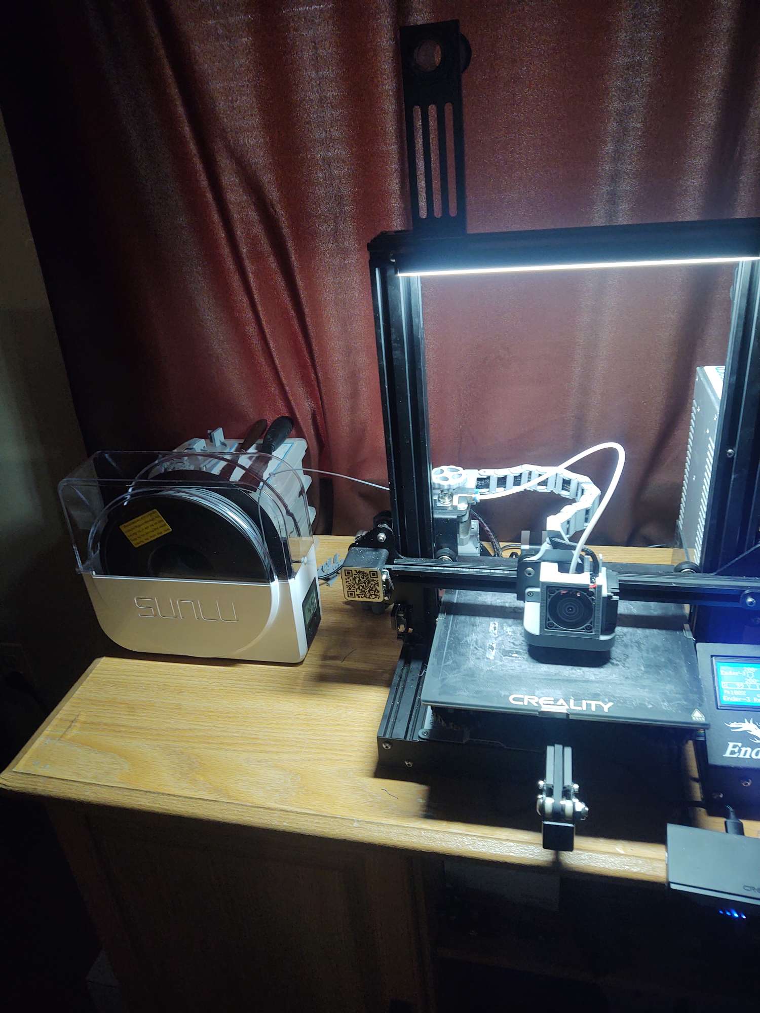 Just added a filament dry box to my ender 3 setup . Working pretty good and seeing better print ...