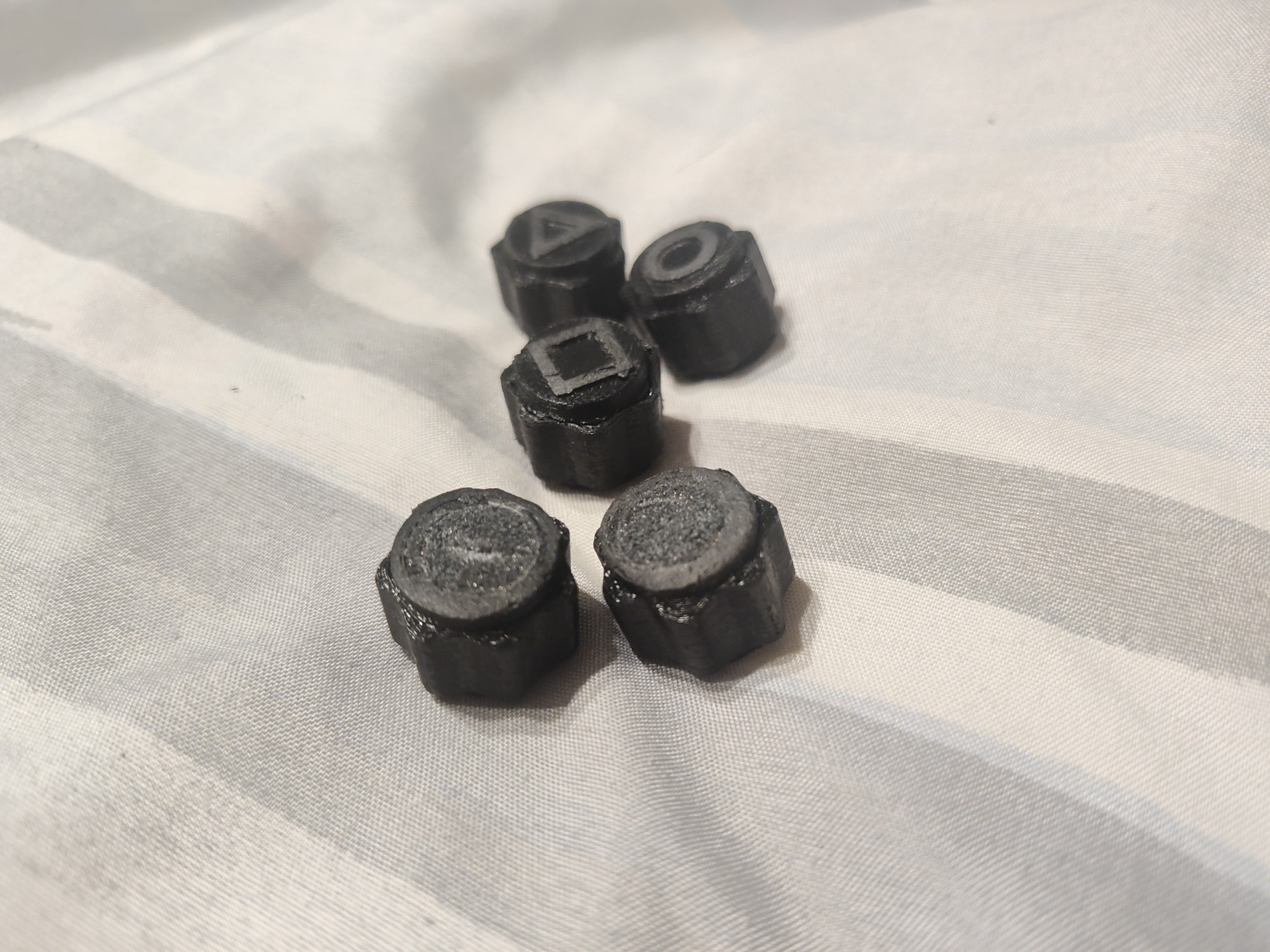 Drilled holes in the bottom of the dice and added weighted putty. Then ...