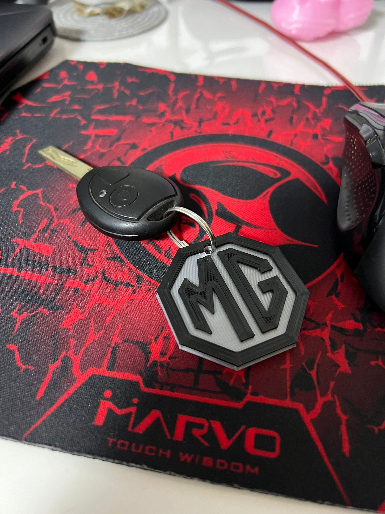 MG Keychain Logo | 3D models download | Creality Cloud