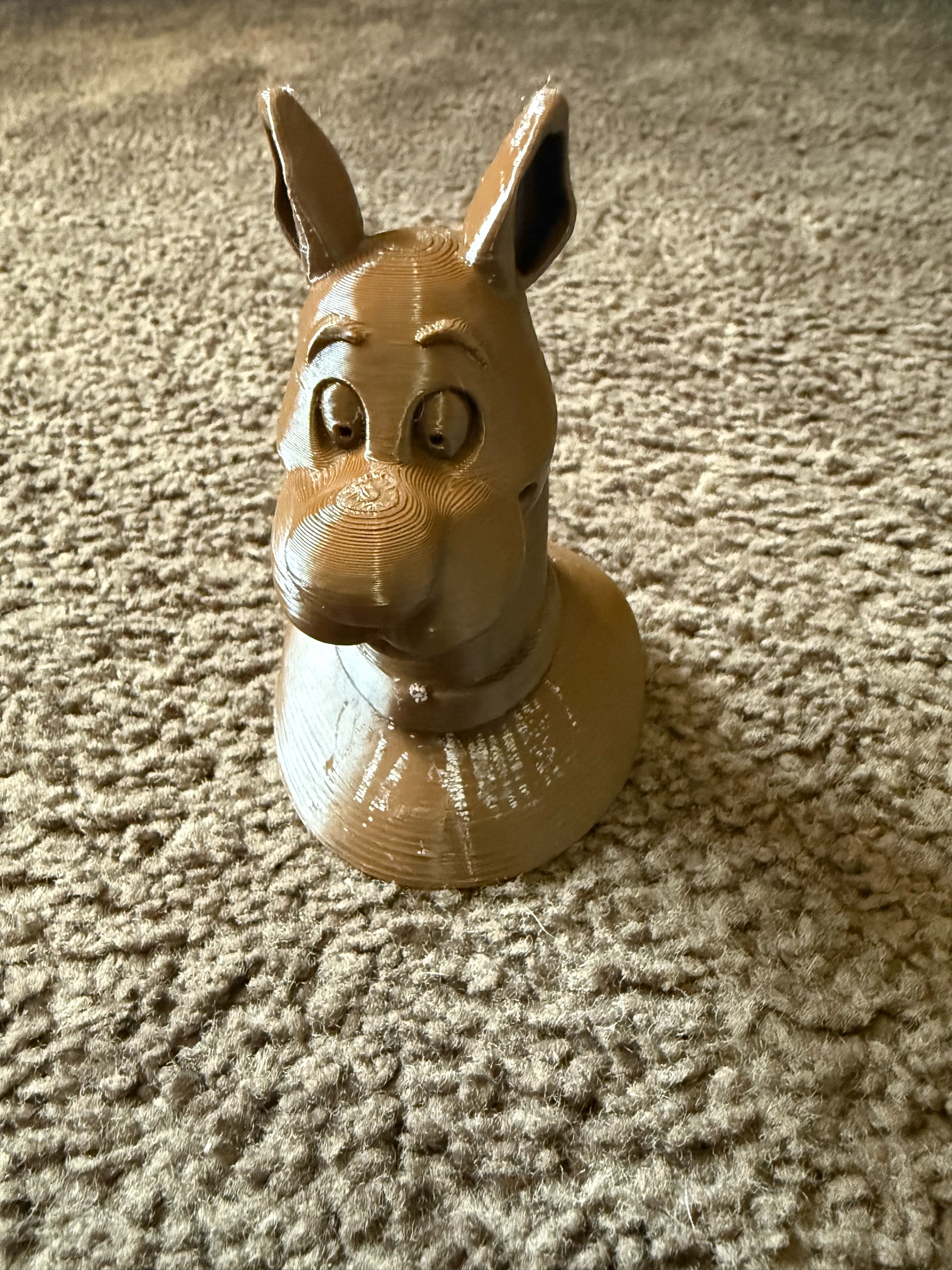 Printed in brown PLA. Tree support removal scratched the base a little ...