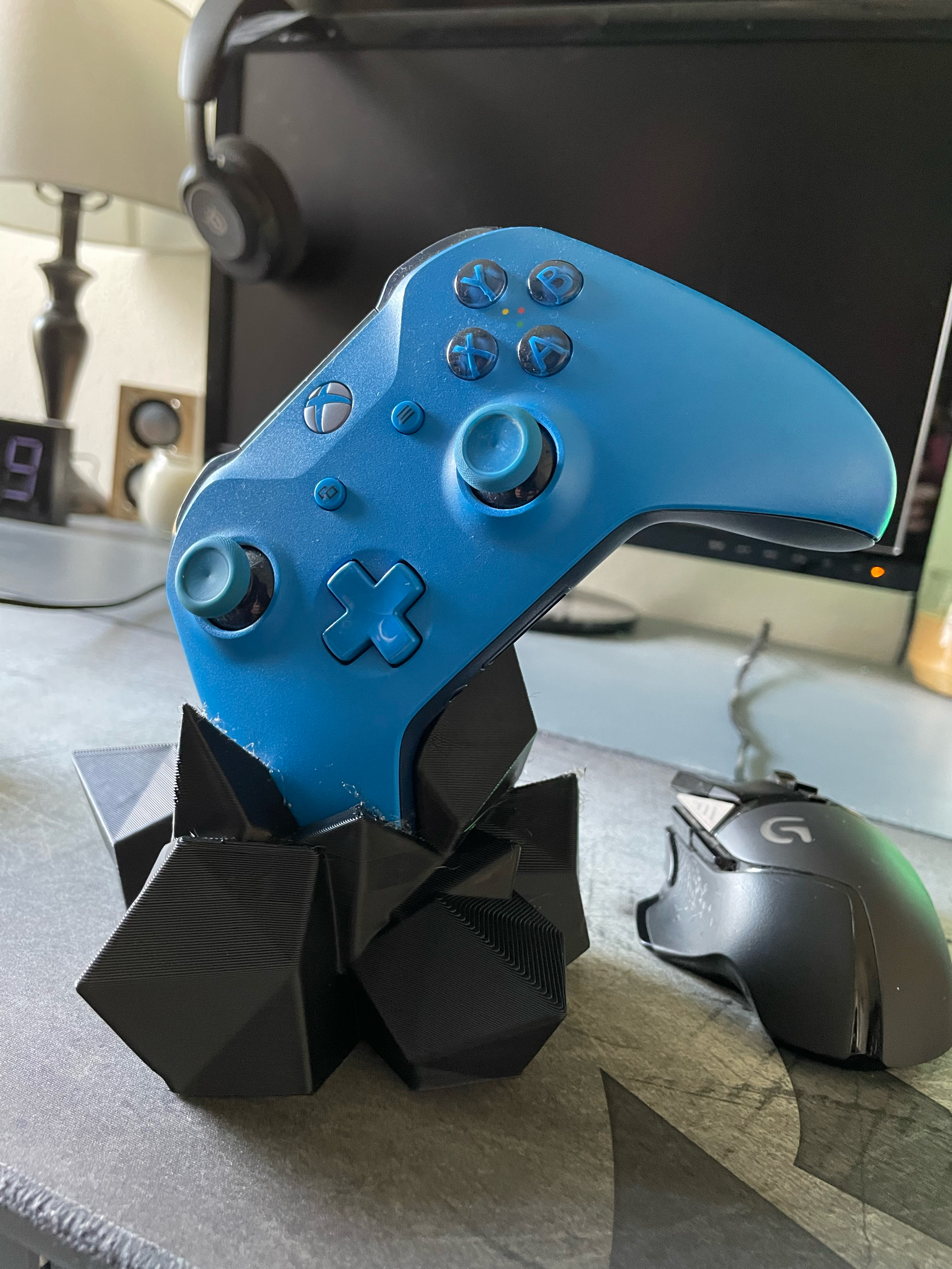 I absolutely love. This holder fits the controller really snug and ...