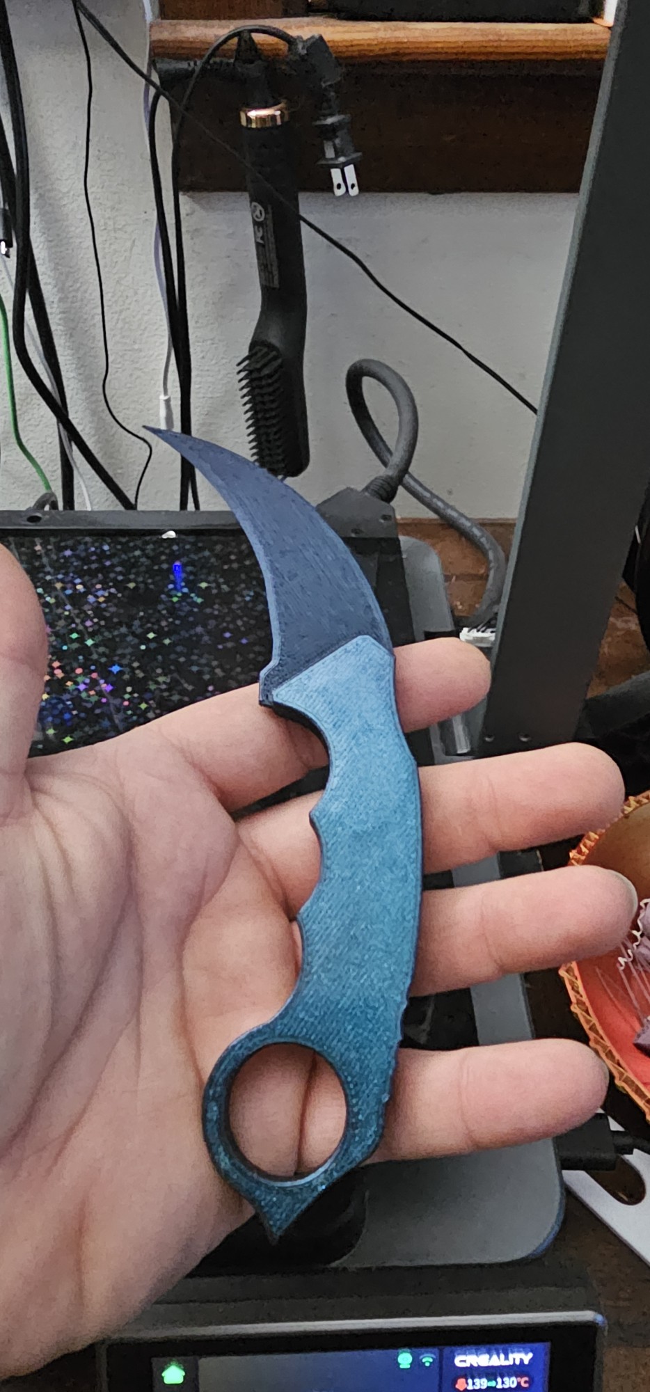 Increased size by 200%, printed with burnt titanium PLA from Flashforge. It turned out very nice ...