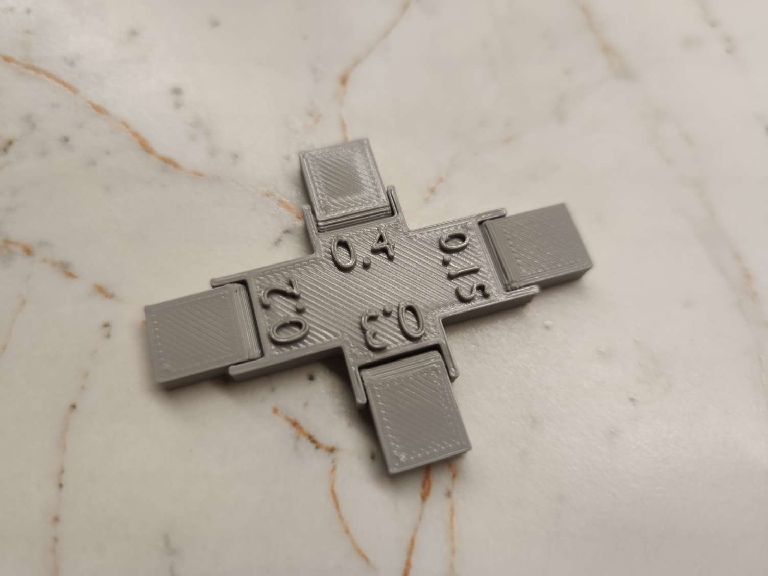 here's a crude tolerance test I did with a 0.4 nozzle and pla. 1.5mm ...