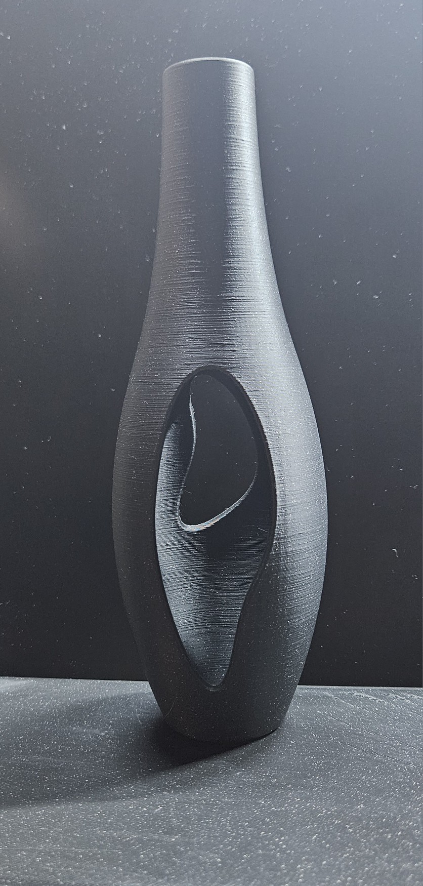 Pretty cool art piece. Just your usual vase for fake or dead flowers ...