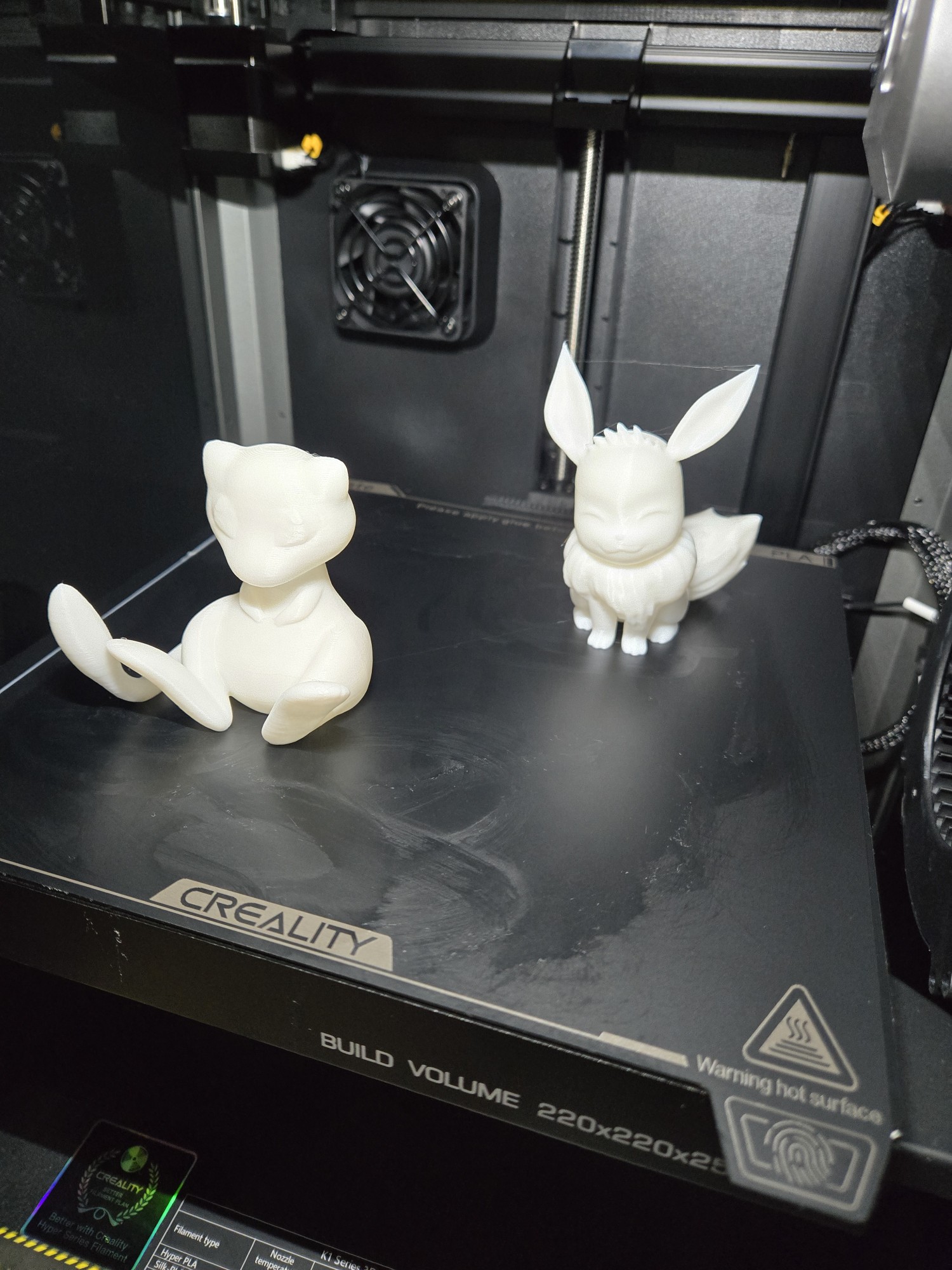 Attempted two at once, both turned out really well. bottom of mew had a few rough spots but ...